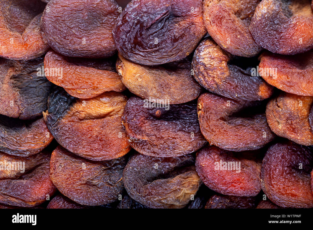 Organic dried apricots, background Stock Photo - Alamy