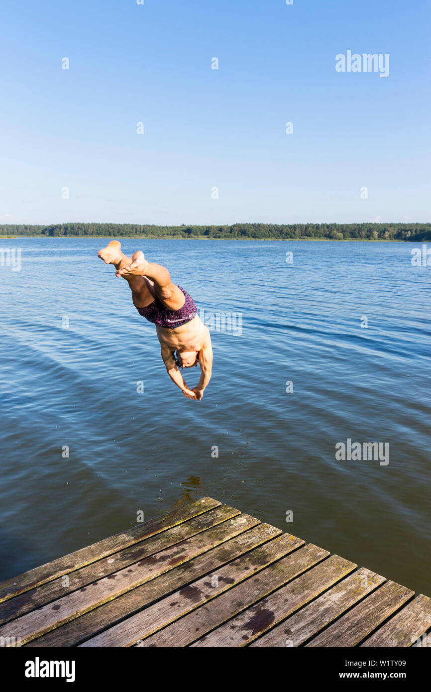Man diving into water, plunge, swimming, diving into water, family ...