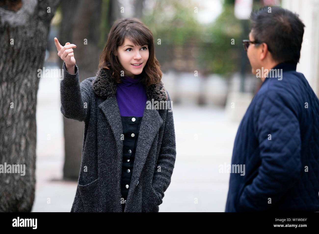 Girl street asking directions hi-res stock photography and images - Alamy