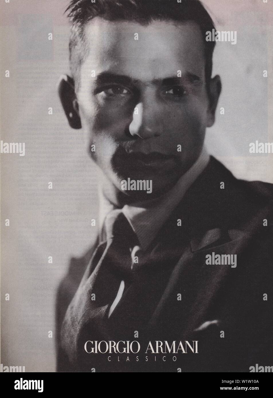 poster advertising Giorgio Armani male model in paper magazine from ...