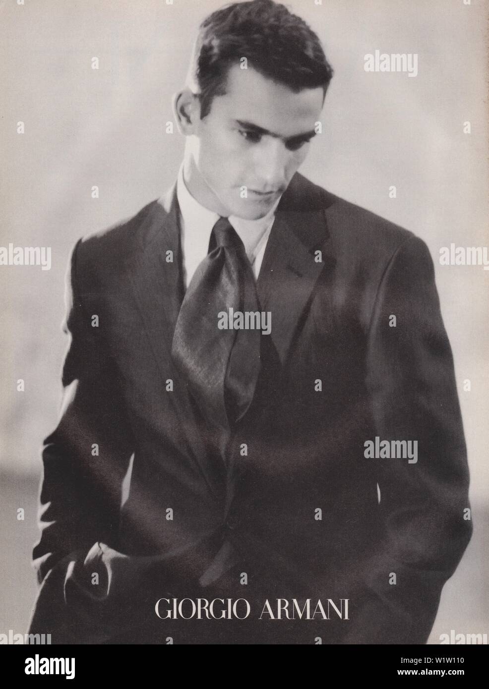poster advertising Giorgio Armani male model in paper magazine from ...