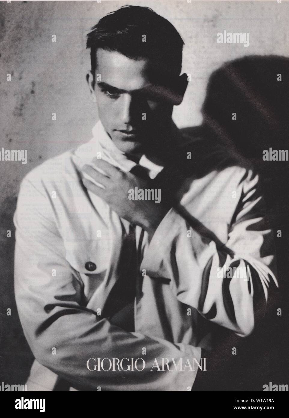 poster advertising Giorgio Armani male model in paper magazine from ...