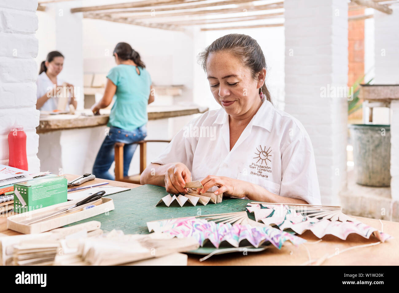 workers producing diverse things with their fine art paper, historical ...