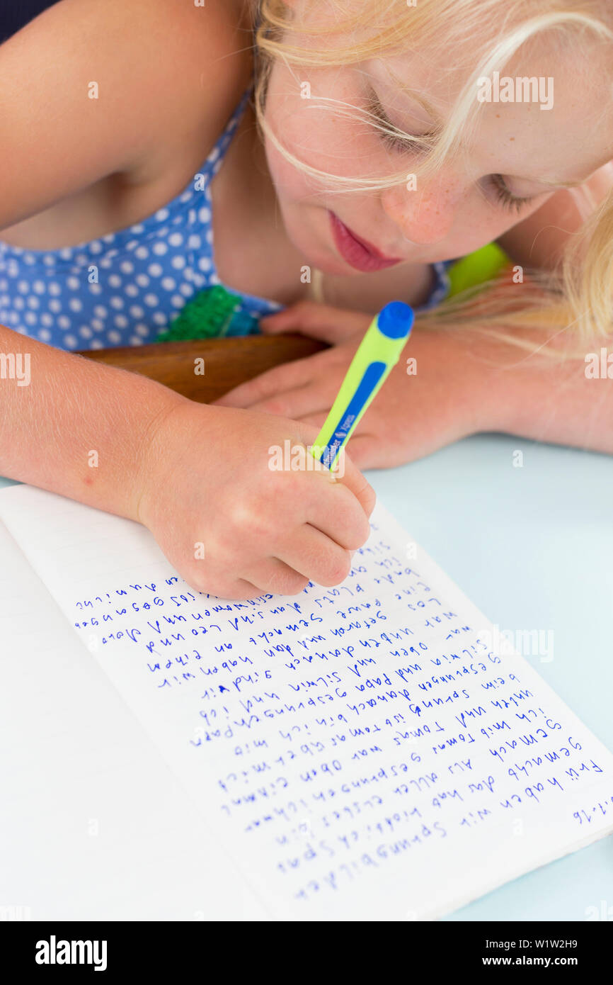 Playing, reading, writing diary, with children on a houseboat ...