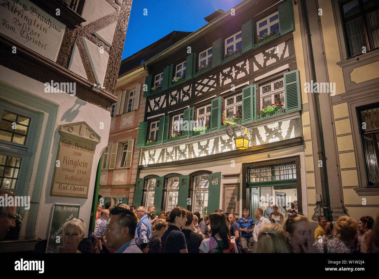 People in the alleys of Bamberg in front of the famous brewery Zum ...