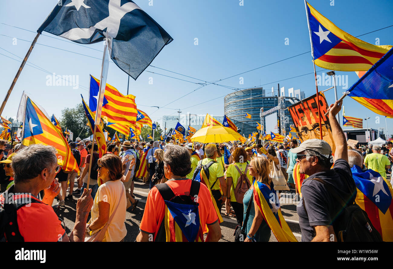 Strasbourg, France - Jul 2 2019: Large group of people holding Estelada ...