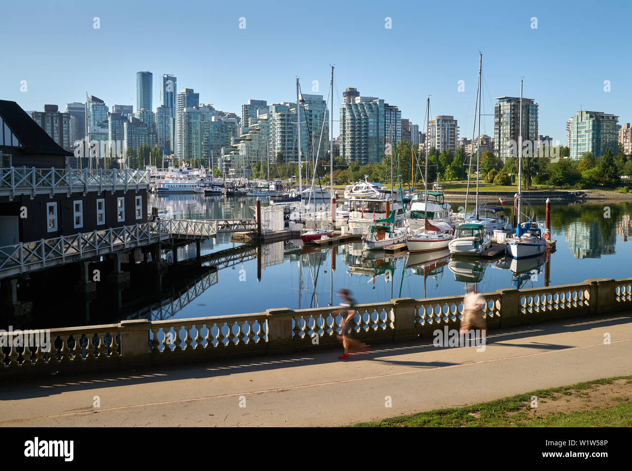 Stanley Park Coal Harbor Seawall. Stanley Park reflections in Coal ...