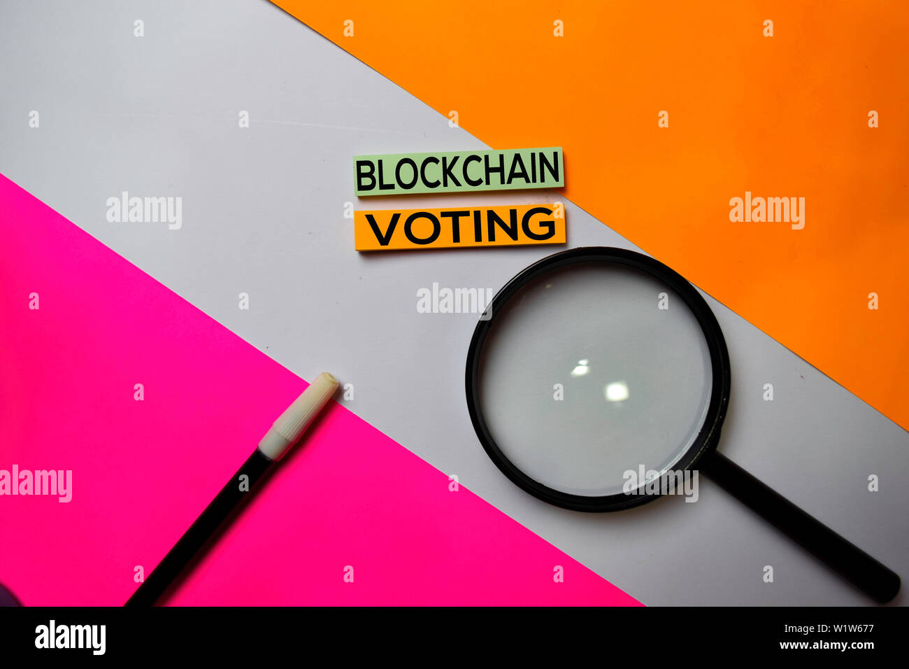 Blockchain Voting text on sticky notes with color office desk concept ...