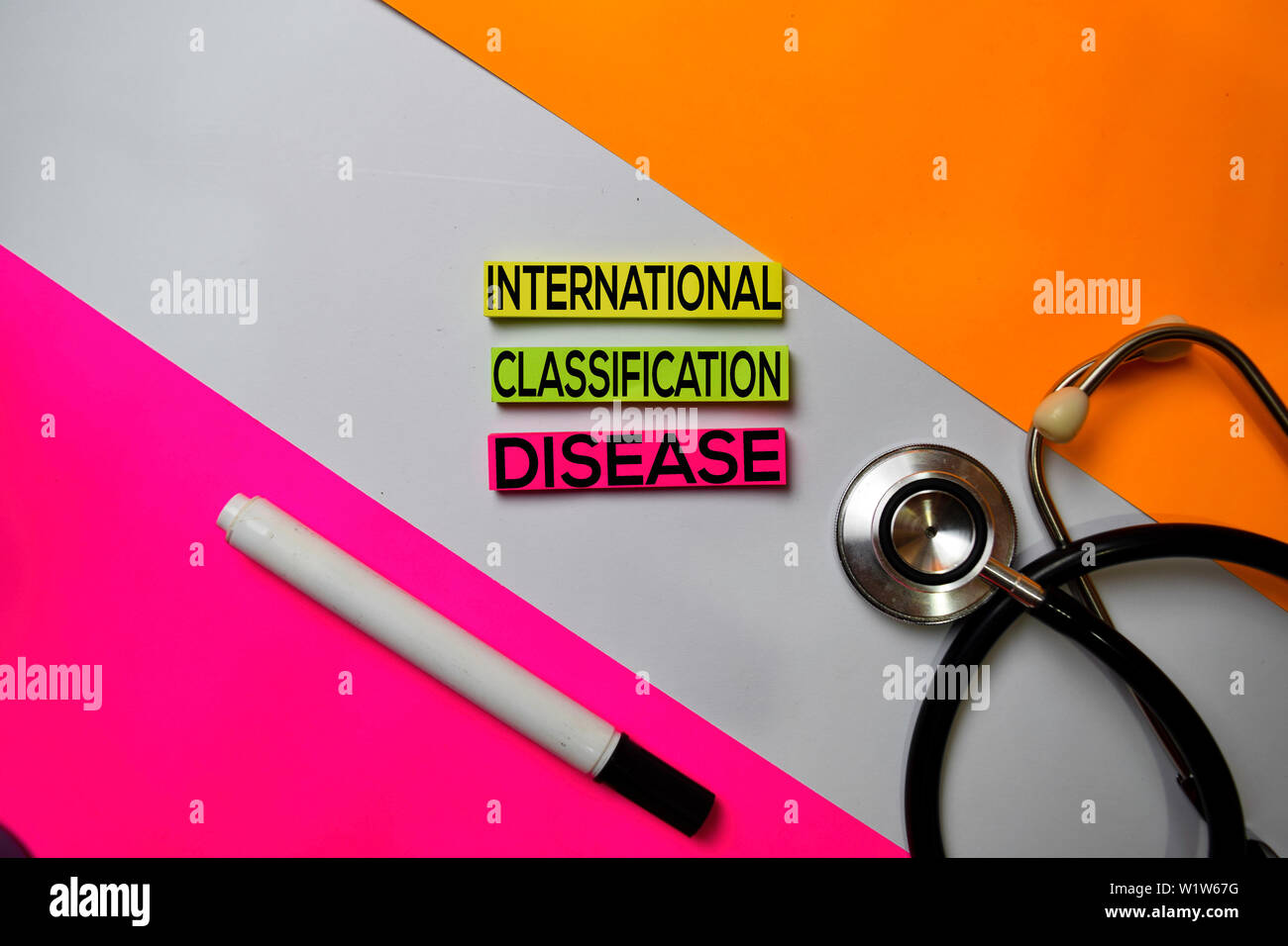 International Classification Disease (ICD) text on sticky notes with ...