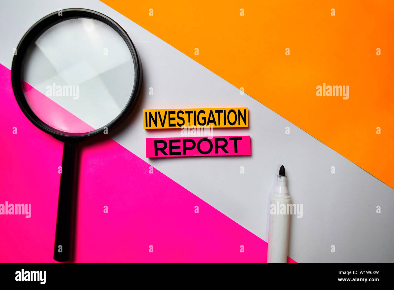 Investigation Report text on sticky notes with color office desk ...