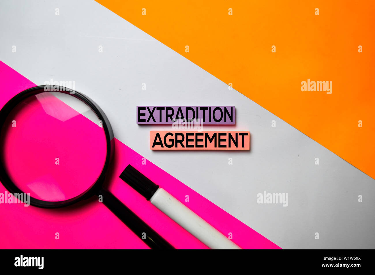Extradition Agreement text on sticky notes with color office desk ...