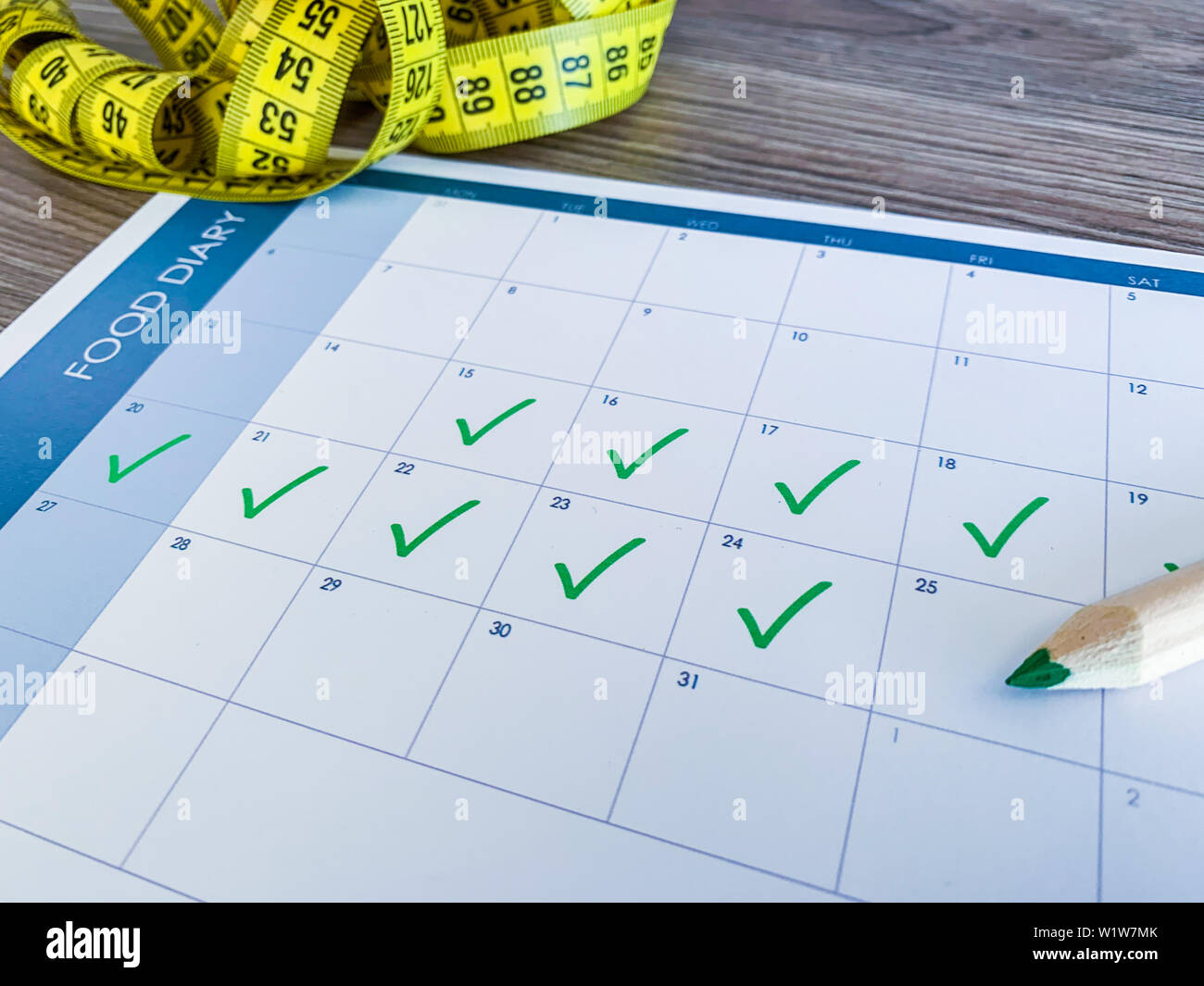 Health concept. Diet plan on wooden background Stock Photo - Alamy