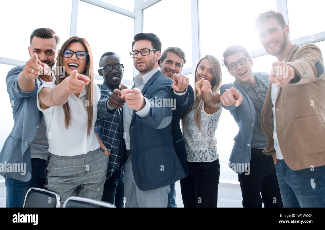 group of young employees pointing at you Stock Photo - Alamy