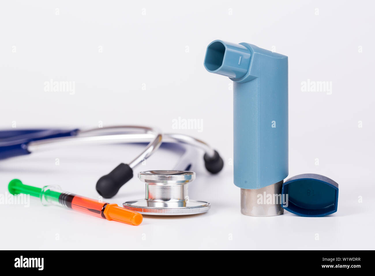 medical tool stethoscope'syring and asthma inhaler on white background ...