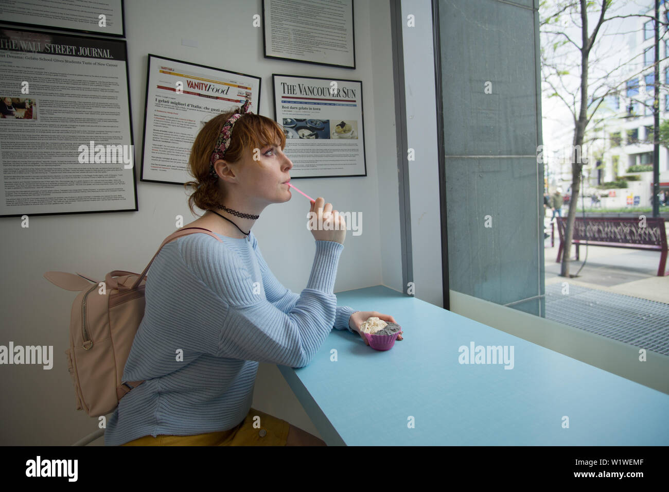 girl eating gelato Stock Photo - Alamy