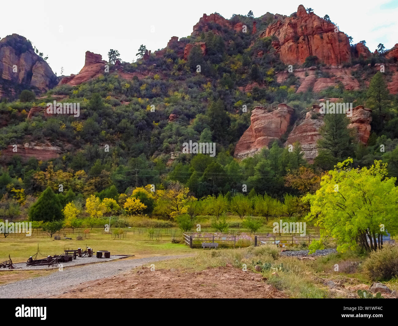 Antique Farm Equiment and Red Rock Mountains in Slide Rock State Park ...