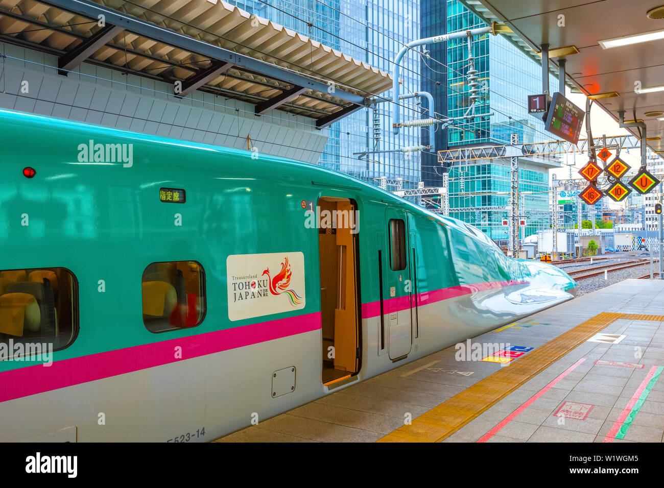 Tokyo, Japan - April 27 2018: Japanese Shinkansen high speed train at a train station Stock ...