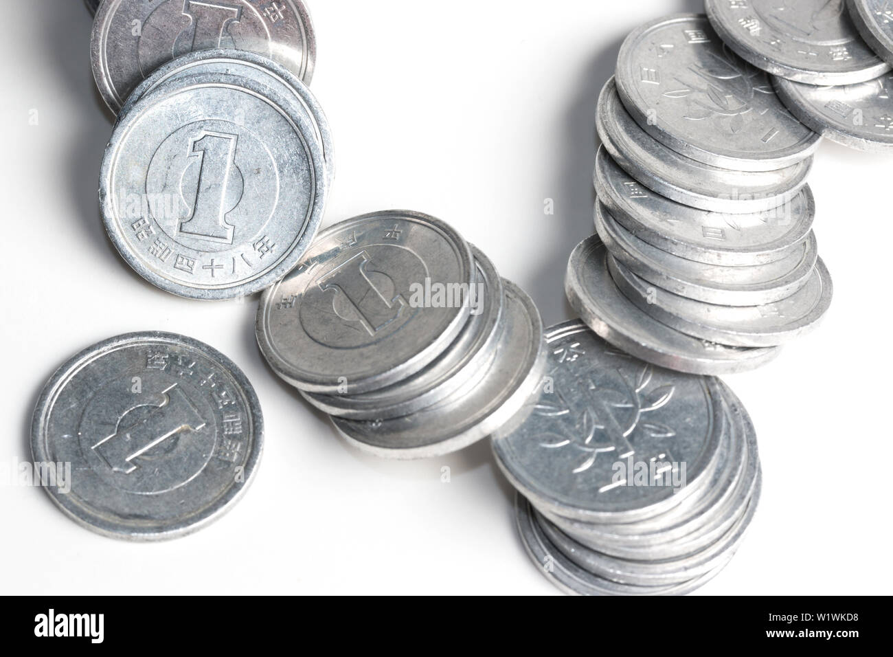 Pile of 1 yen coins japanese money, close up isolated on white ...