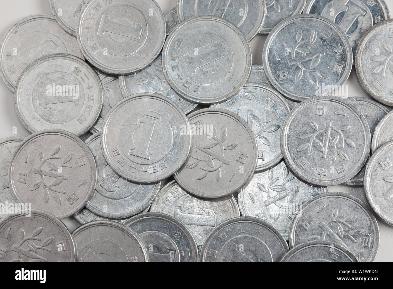 Pile of 1 yen coins japanese money, close up isolated on white ...