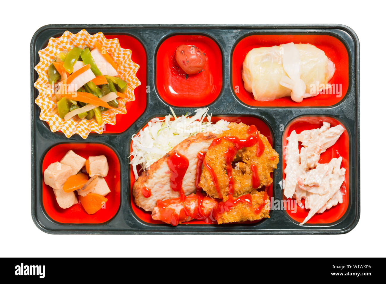 Japan Food set of chicken fritter and other in a box isolated on white ...