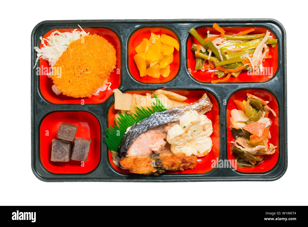 Japan Food set of salmon grilled and other in a box isolated on white ...