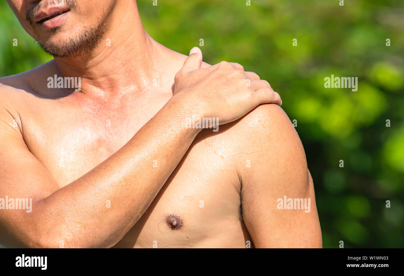 Hand gripping shoulder hi-res stock photography and images - Alamy