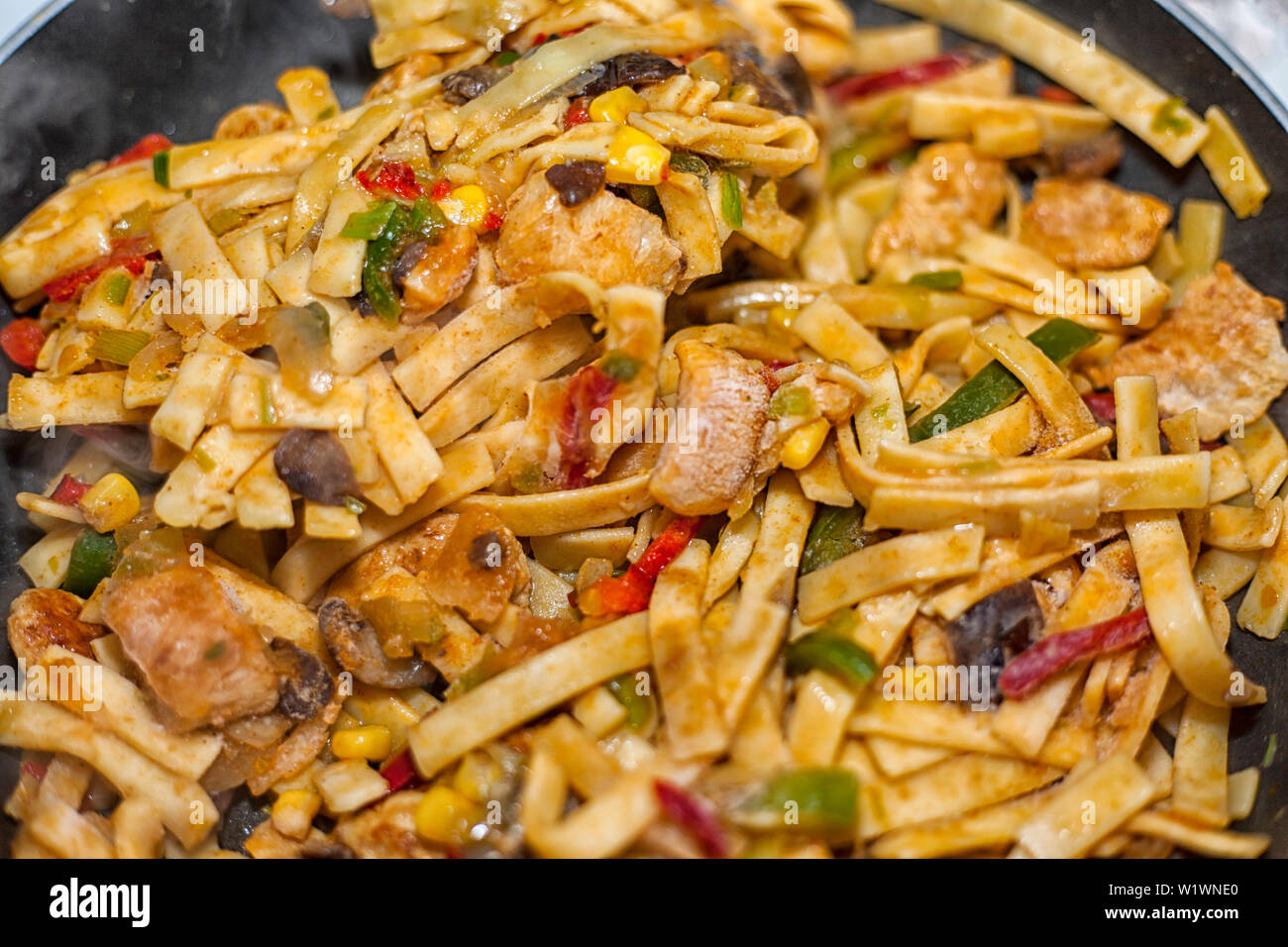 Bami Goreng is a pasta dish. Dish is made on a indonesian way with ...