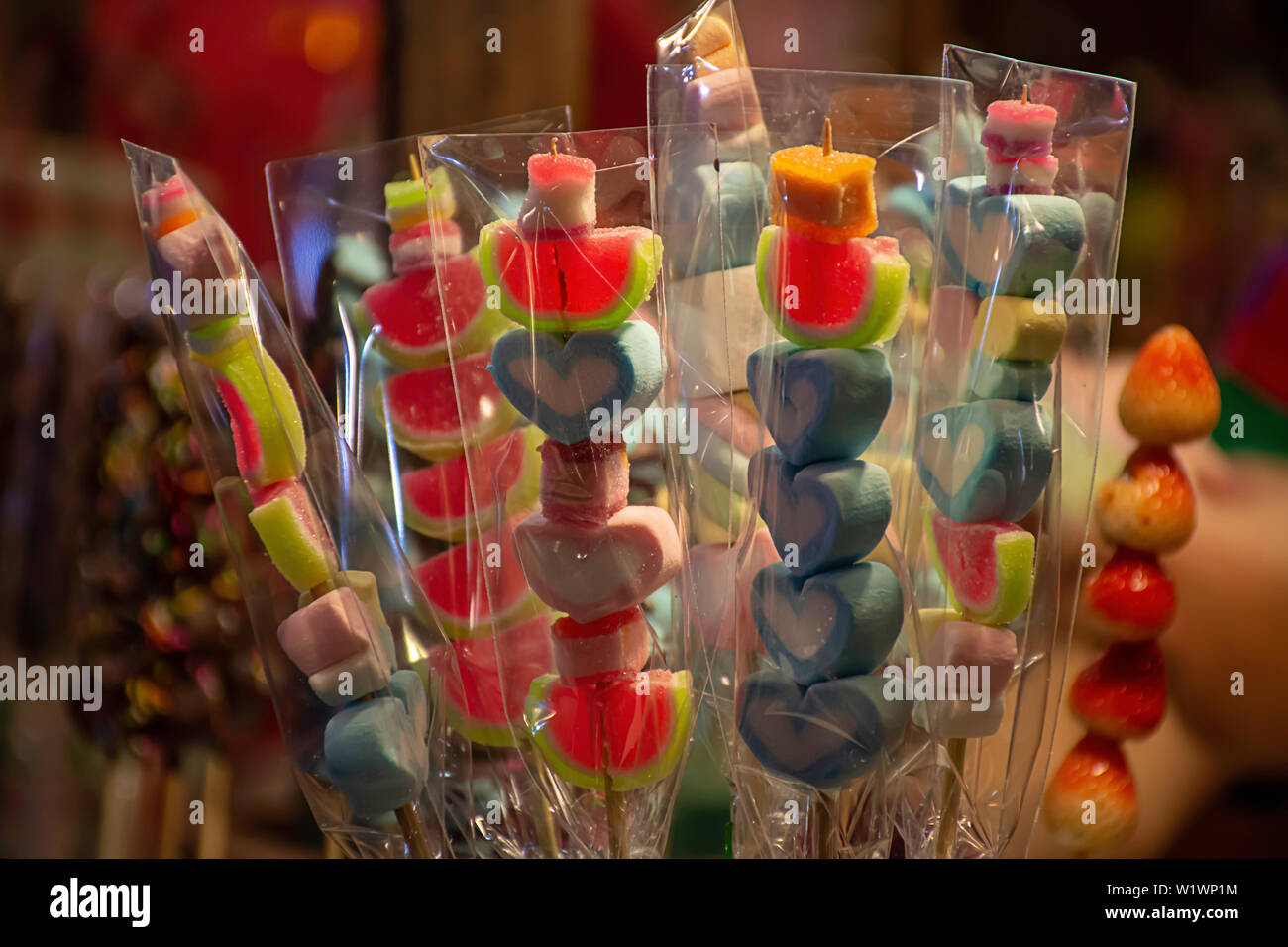 Jelly candy hearts and watermelon with beautiful color plug with bamboo ...