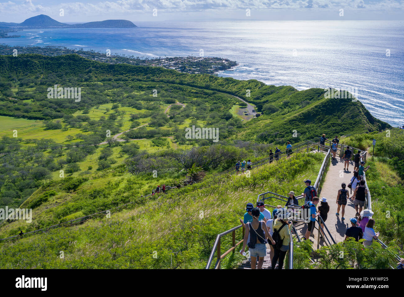 Tourists hike to top of Diamond Head to see old artillery bunkers of ...