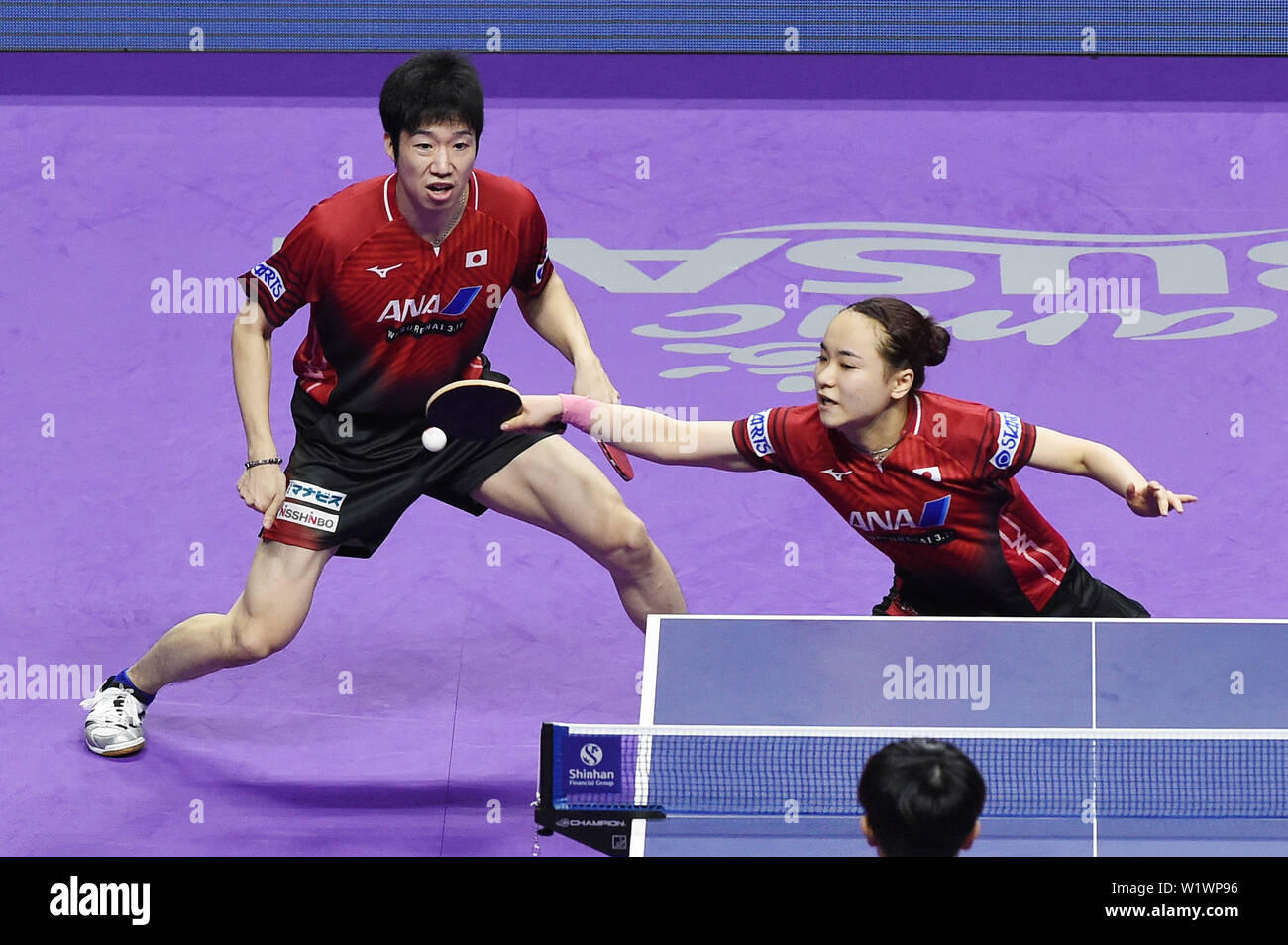 Busan, South Korea. 4th July, 2019. Jun Mizutani (JPN), Mima Ito (JPN ...