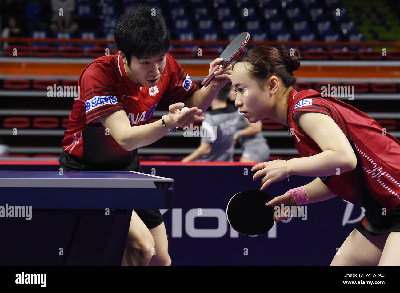 Busan, South Korea. 4th July, 2019. Jun Mizutani (JPN), Mima Ito (JPN ...