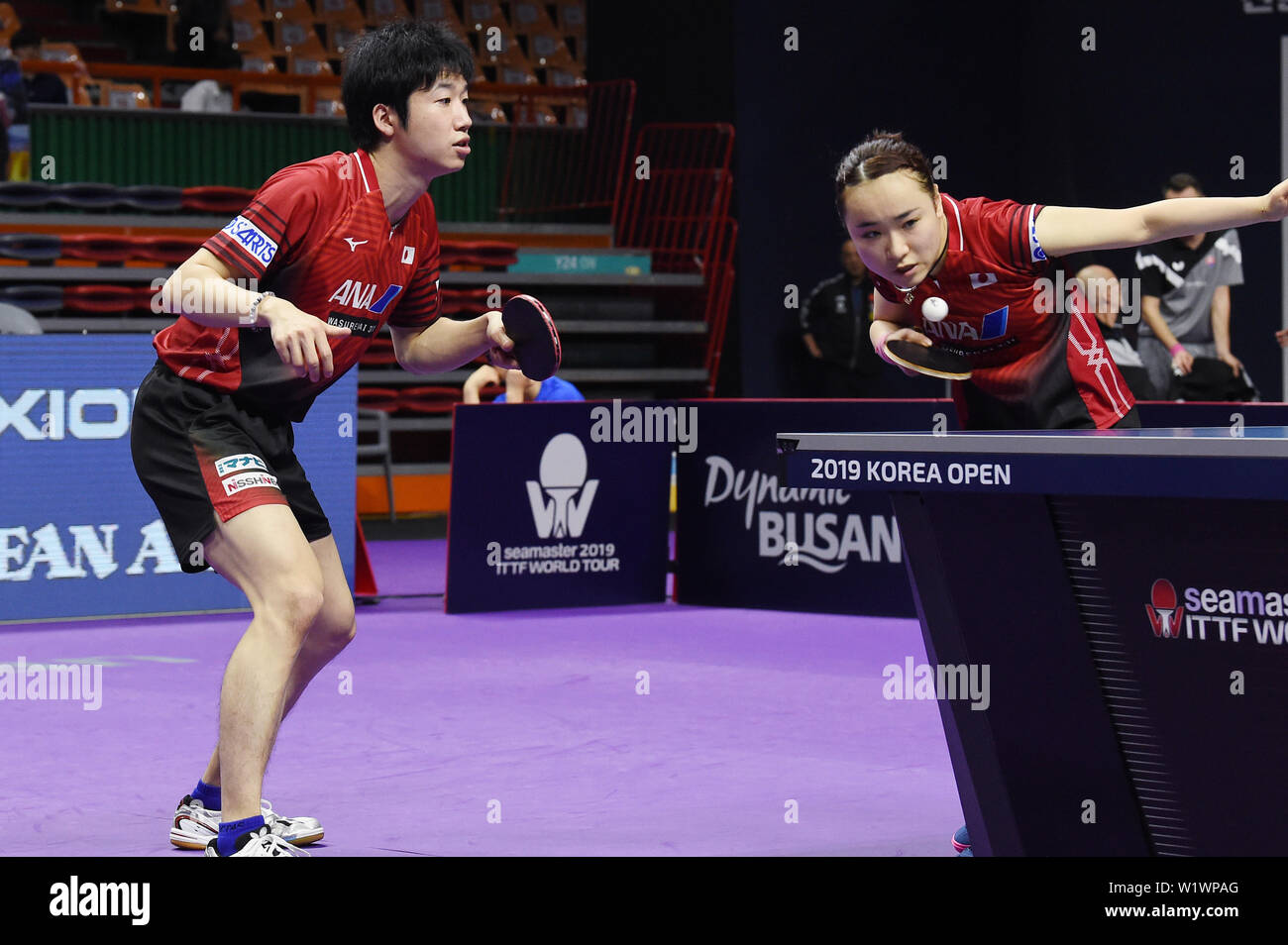 Busan, South Korea. 4th July, 2019. Jun Mizutani (JPN), Mima Ito (JPN ...