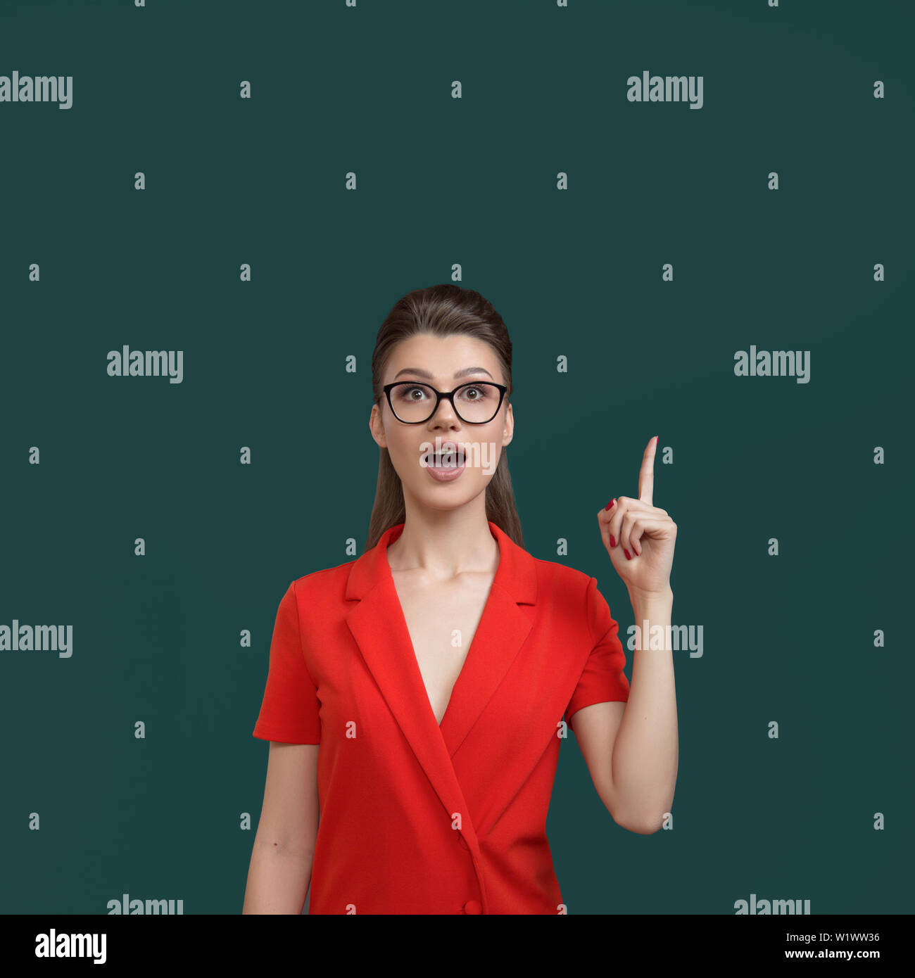 Woman points up hi-res stock photography and images - Alamy