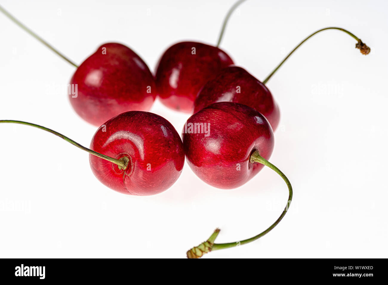 delicious red cherries laying in a circle Stock Photo - Alamy
