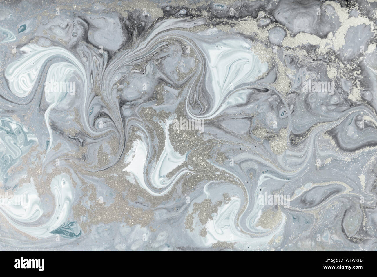 Marbling pattern. Golden powder marble liquid texture Stock Photo - Alamy