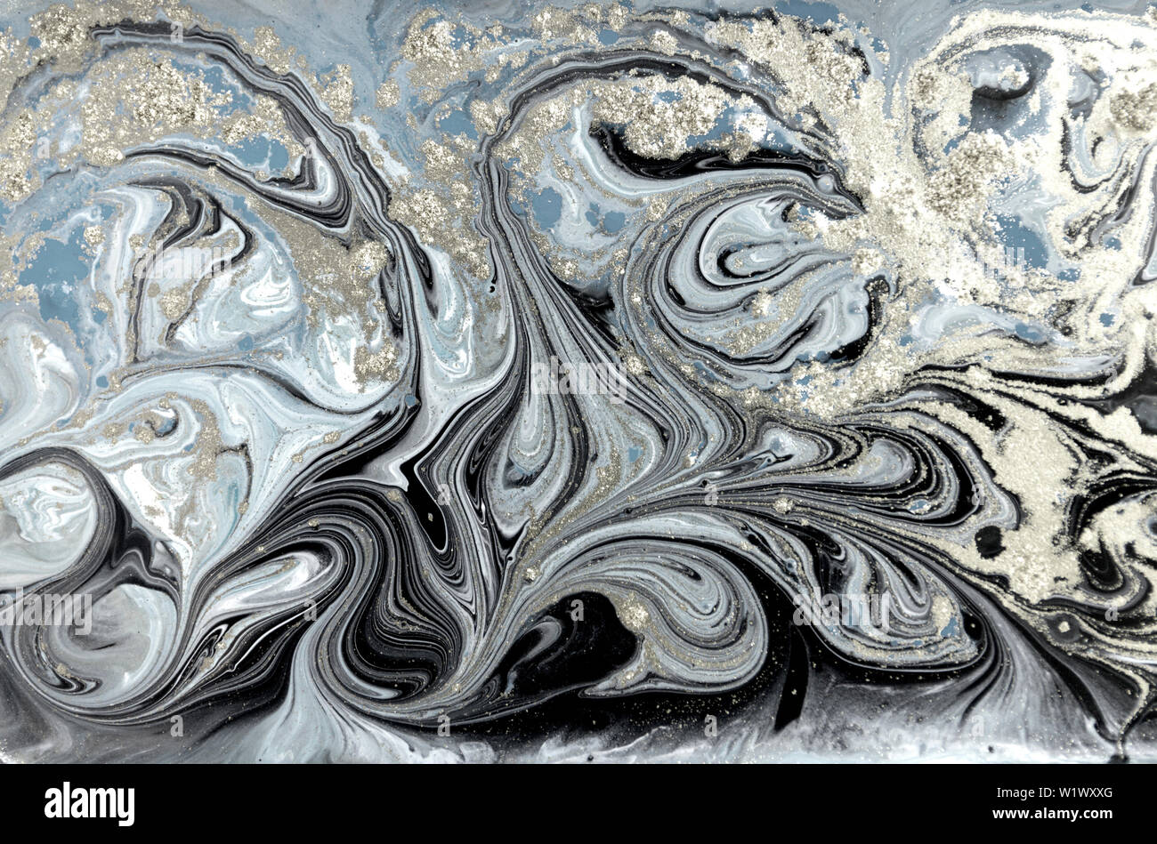 Marbling pattern. Golden powder marble liquid texture Stock Photo - Alamy