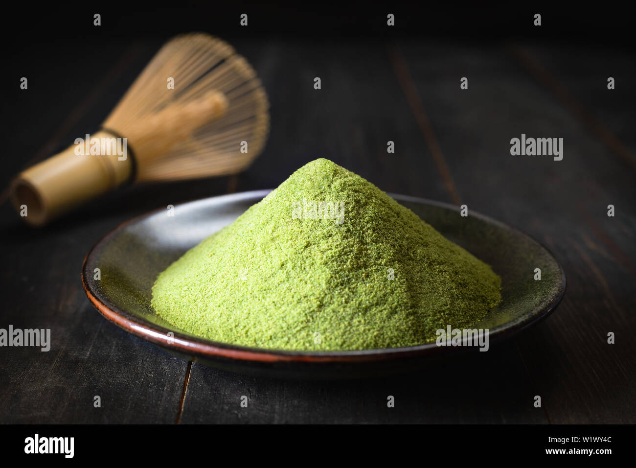Japanese matcha green tea in a cup and tea powder close-up Stock Photo ...