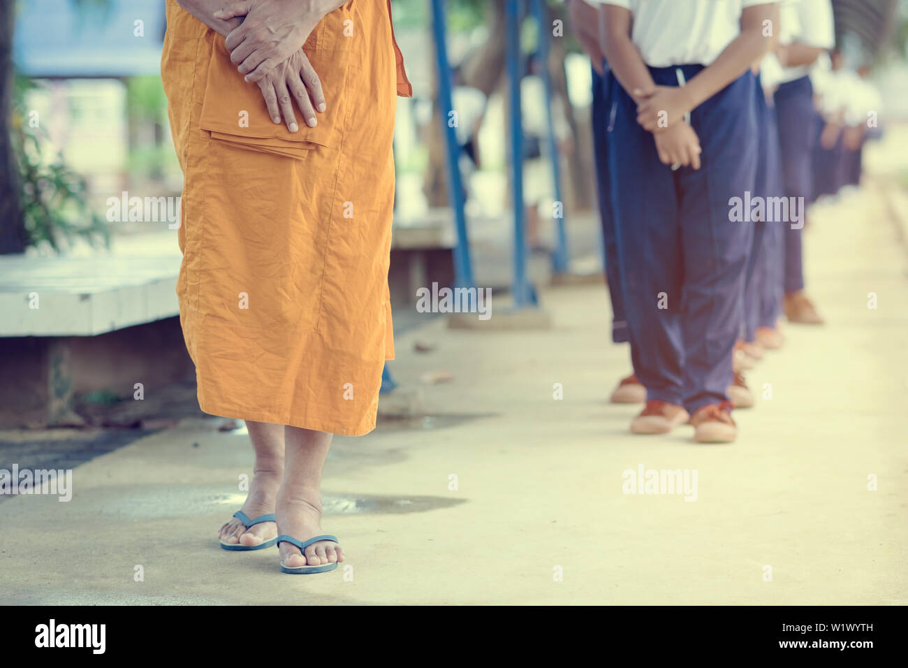 Group of students try to meditate for the peace of mind by walk with ...