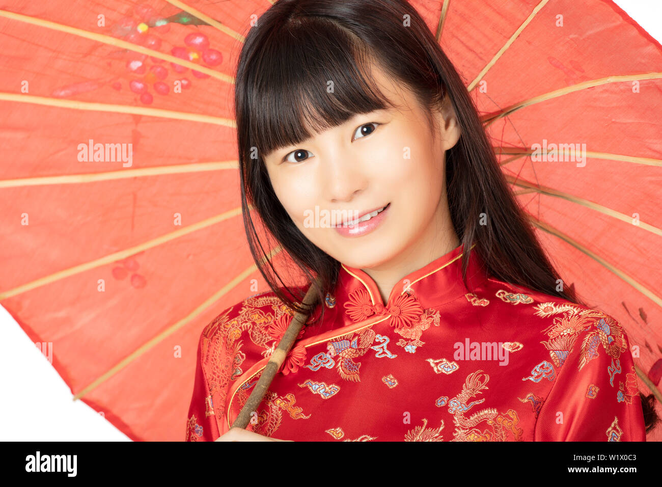 Beautiful Chinese woman wearing a traditional dress known as a ...