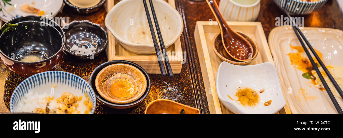 Messy table after meal in Japanese restaurant. Dirty, finish meal ...