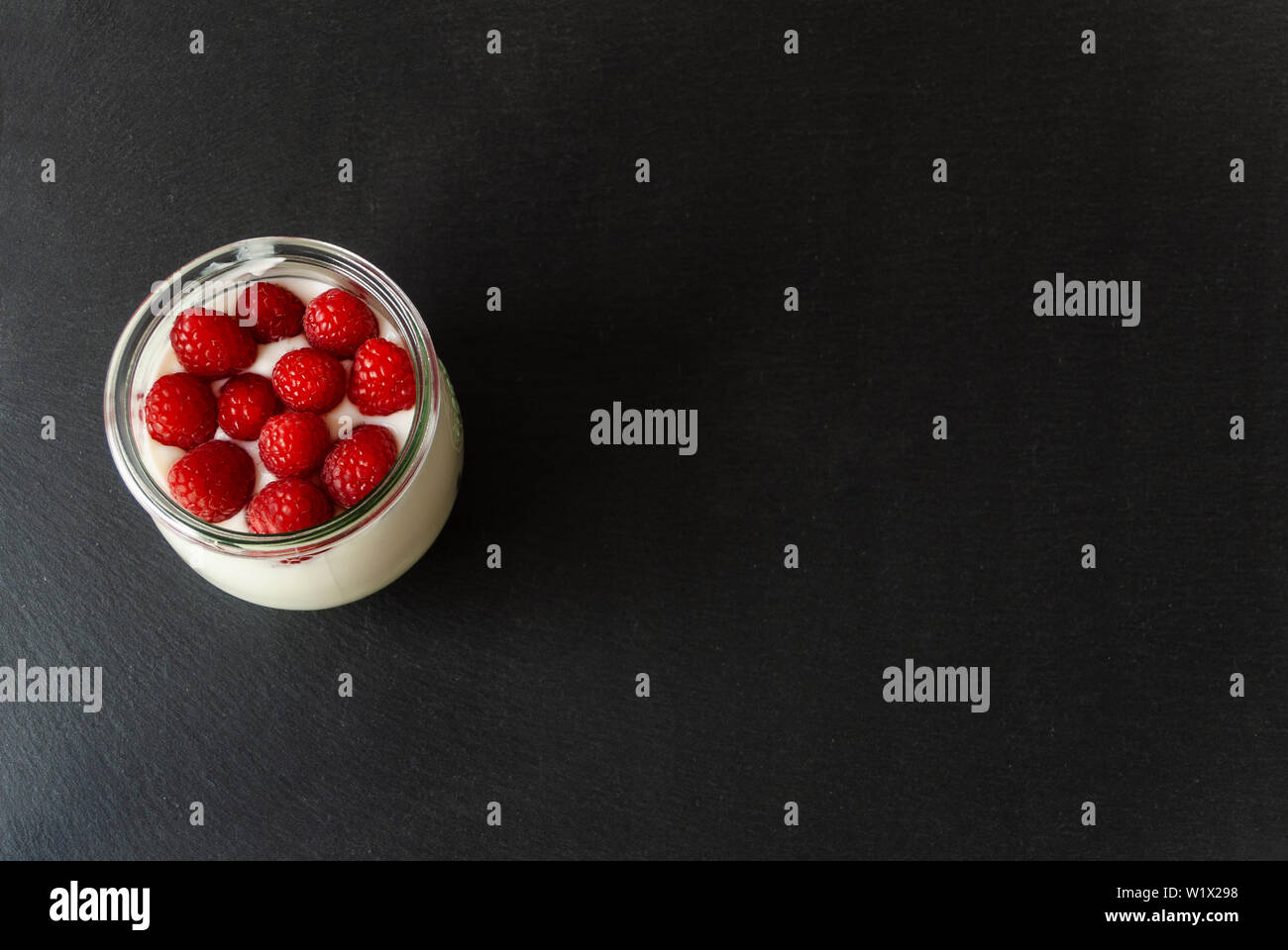 Yoghurt with raspberry Stock Photo - Alamy