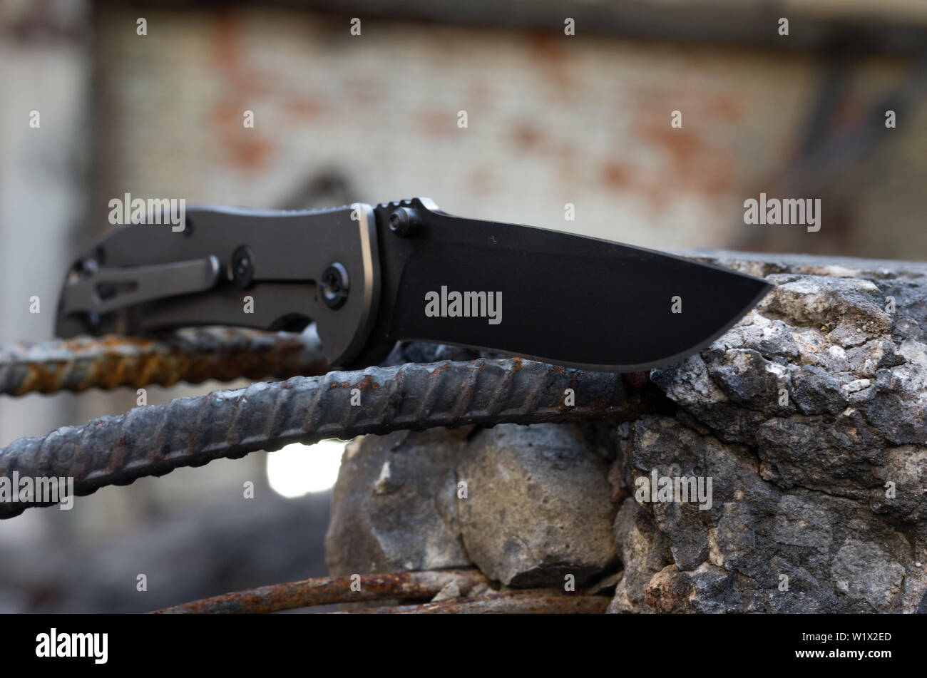 Knife blade at an angle. Kind of knife in front. Knife with aluminum ...