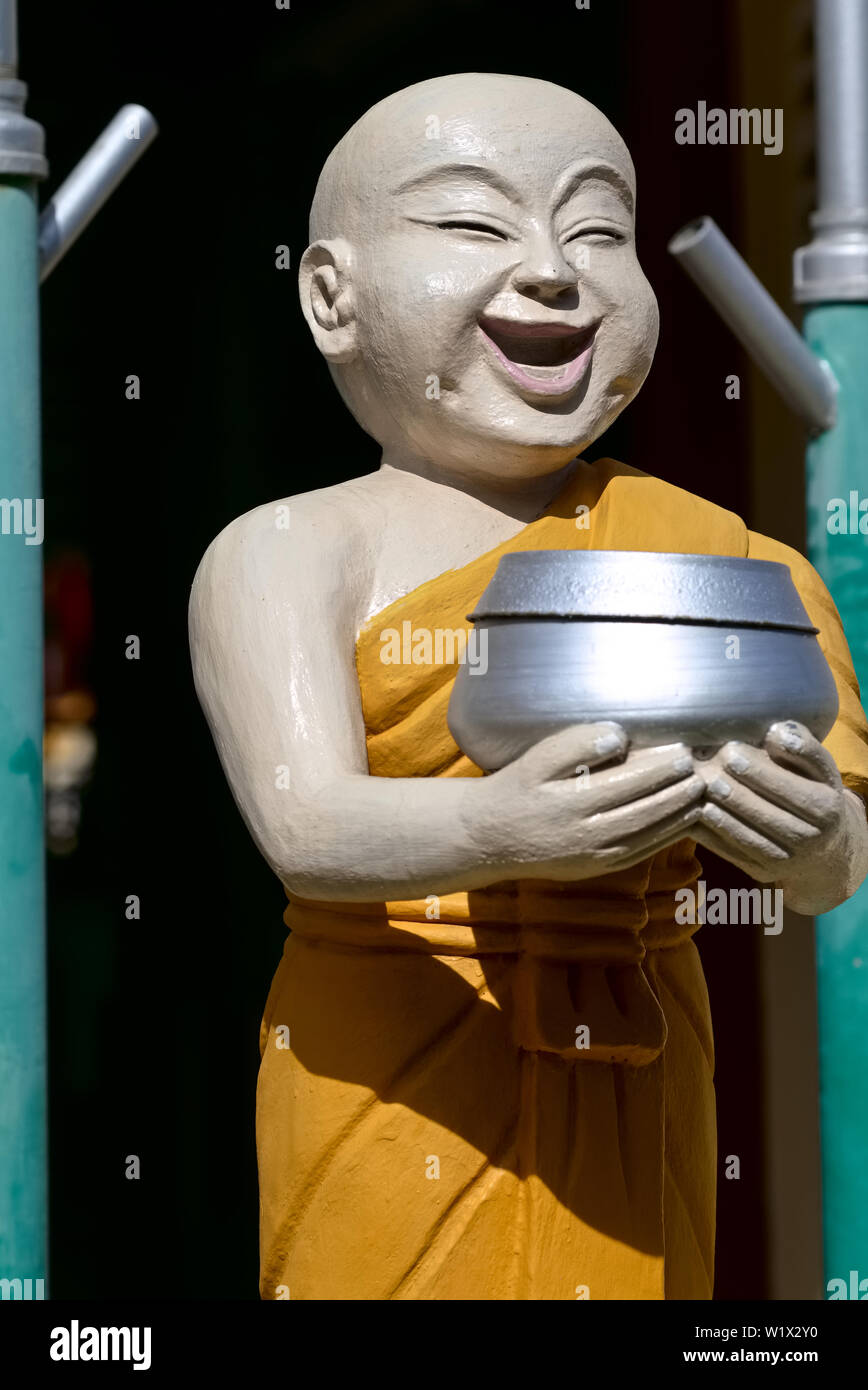 Buddhist monk smiling figure hi-res stock photography and images - Alamy
