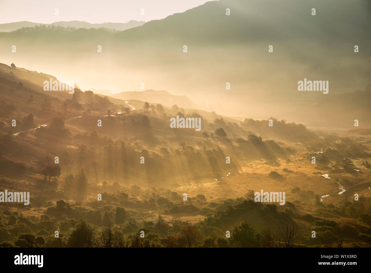 Stunning Autumn Fall landscape sunrise in the Lake District with sun ...