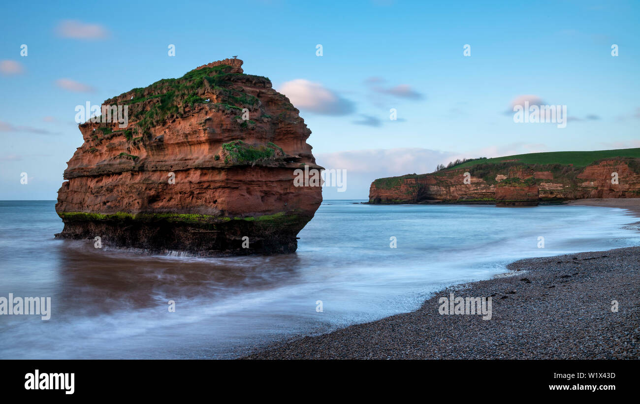 Beautiful sunrise landscape image of Ladram Bay beach in Devon England ...