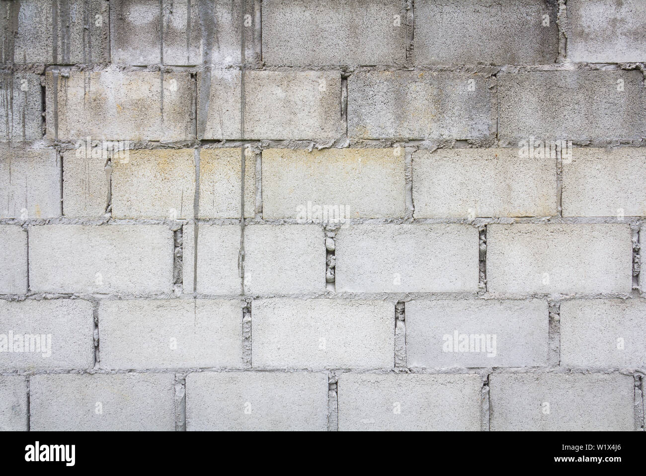 old concrete block wall background texture Stock Photo - Alamy