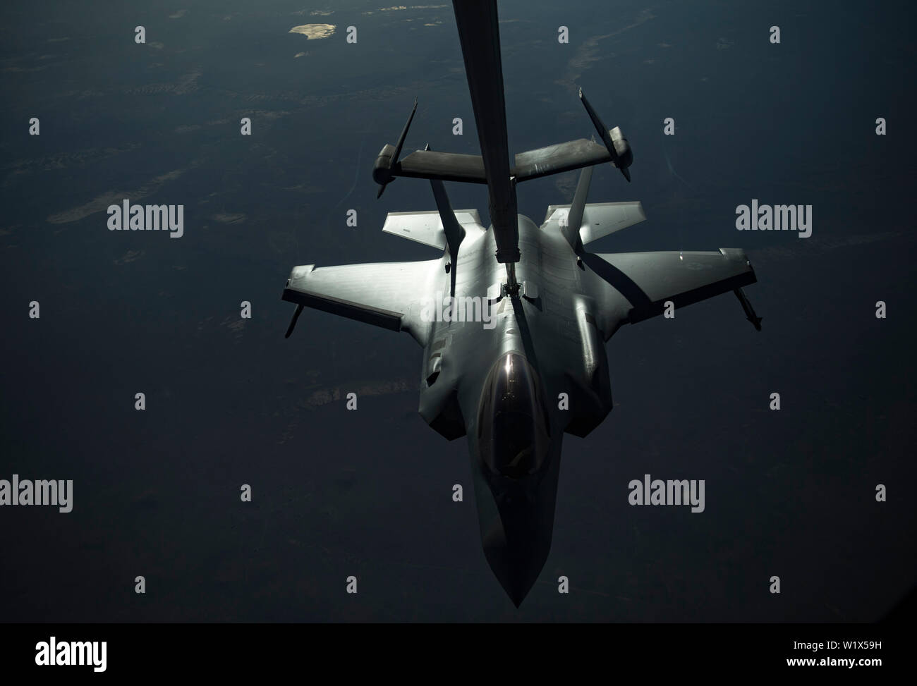 A U.S. F-35A Lightning II conducts aerial refueling with a KC-10 ...
