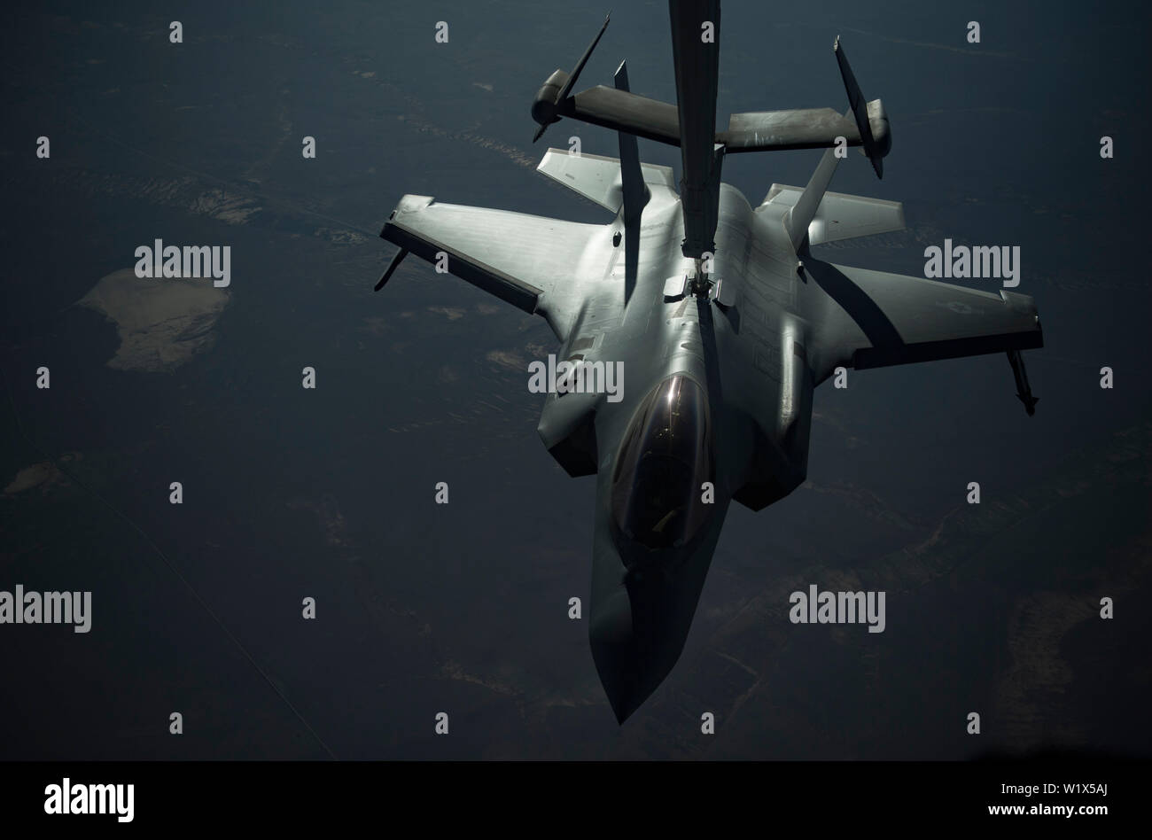 A U.S. F-35A Lightning II conducts aerial refueling with a KC-10 ...