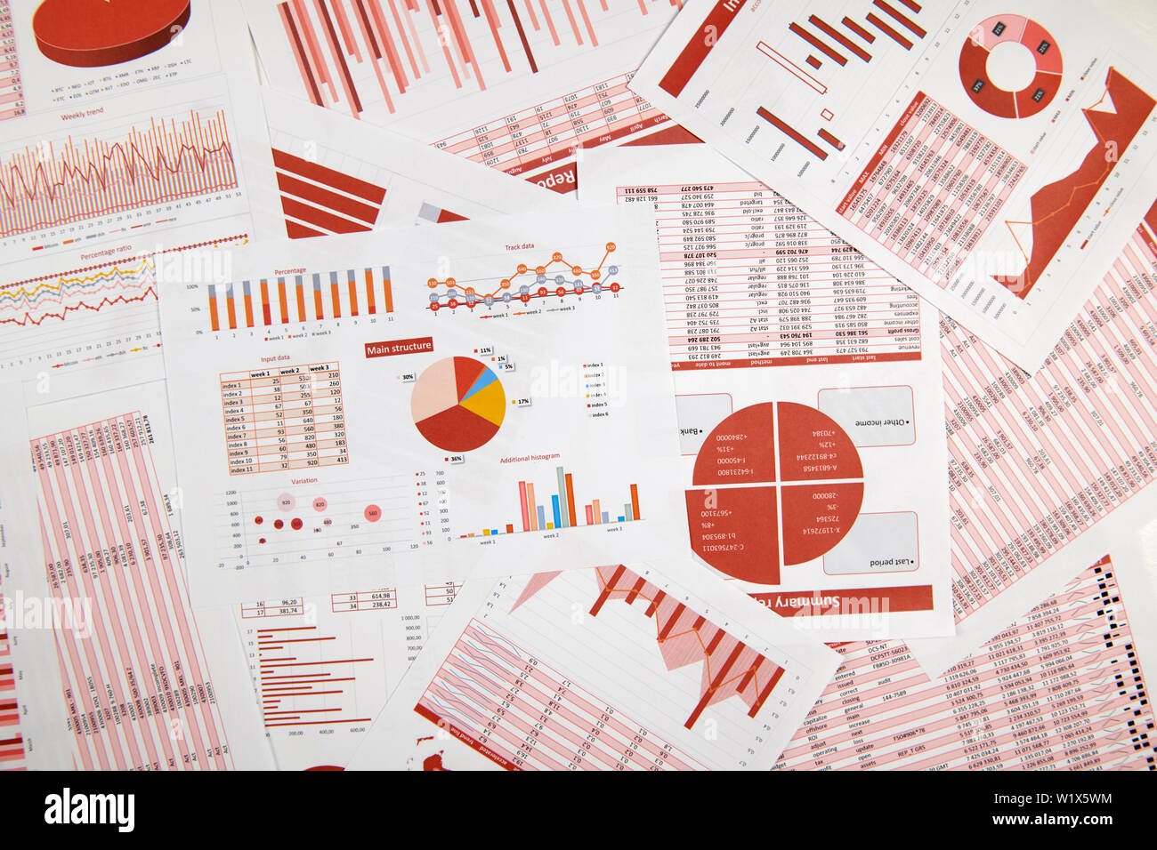 Business reports, data tables and charts - directly above view of ...