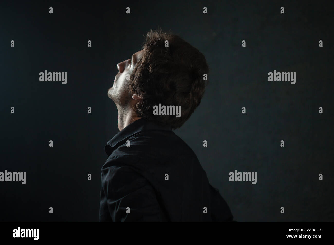 Young black man head turn to side hi-res stock photography and images ...